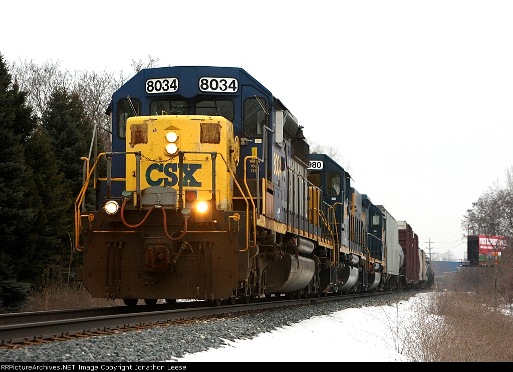 CSX 8034 leads a new slug set west on Q335